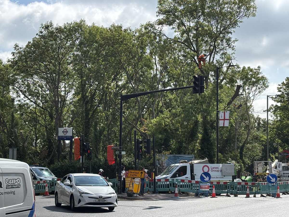 A thinning out of trees around the wooded entrance to High Barnet tube ...