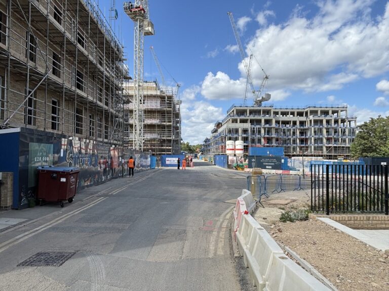 Work well underway on Victoria Quarter flats at New Barnet...but ...